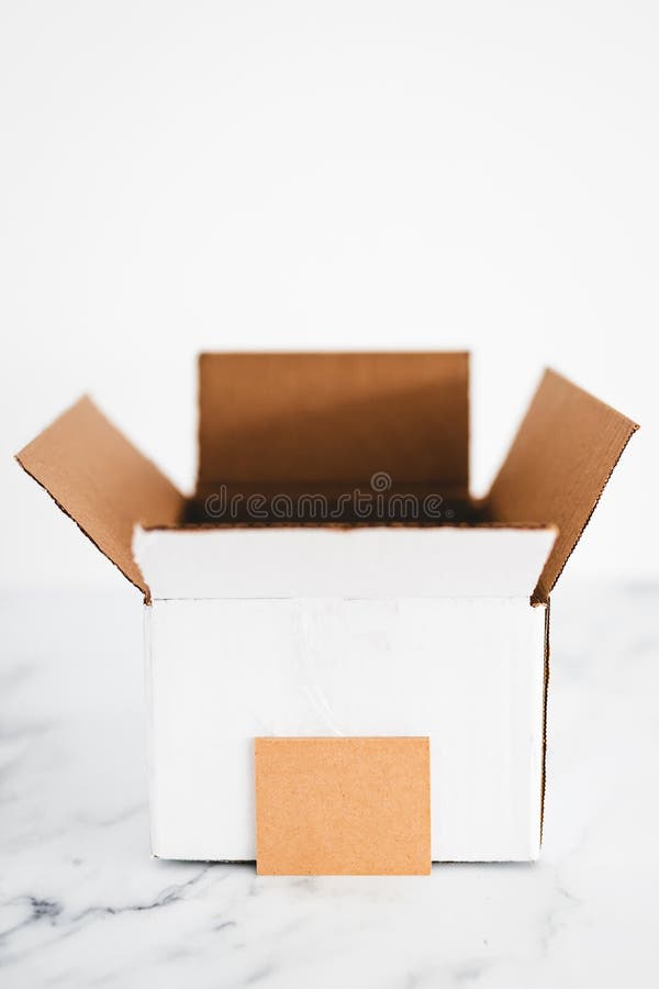 White Open Box or Parcel with Blank Label with Copy Space, Concept of Unboxing Organizing or ...