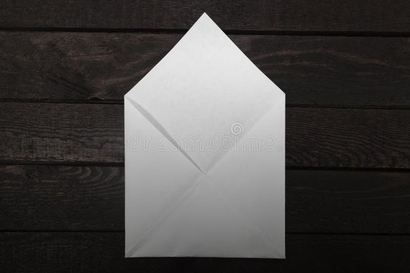 White Opened Envelope from Above on Wood. Gradient Filter. Stock Photo ...
