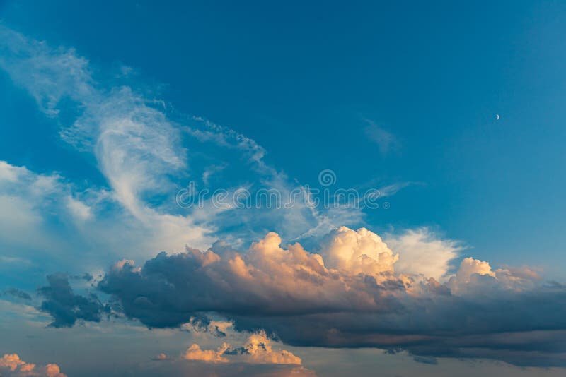 White, Orange and Dark Clouds with Blue Sky on the Sunset Summer ...