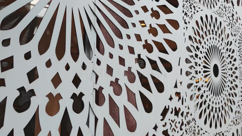 White Ornamental Panels Rotating Showing Intricate Floral and Geometric ...