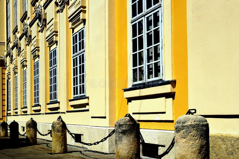 White Painted Wood Windows in Yellow Stucco Elevation. Old Classic ...