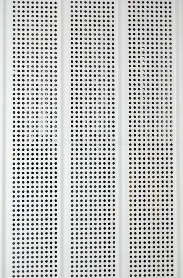 White Panel with Vertical Rows of Apertures. Stock Photo - Image of ...