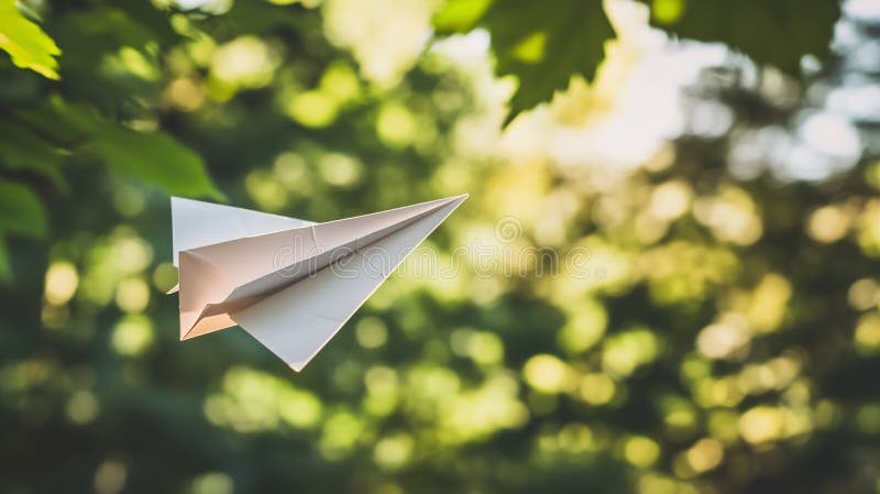 A White Paper Airplane Flying through the Air Stock Photo - Image of ...