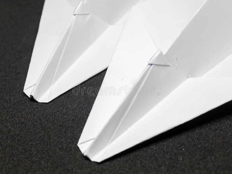 White Paper Airplane Toy on Black Background Stock Photo - Image of ...