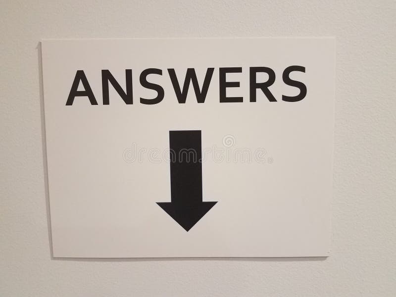 White Paper Answers Sign with Black Down Arrow on Wall Stock Photo ...