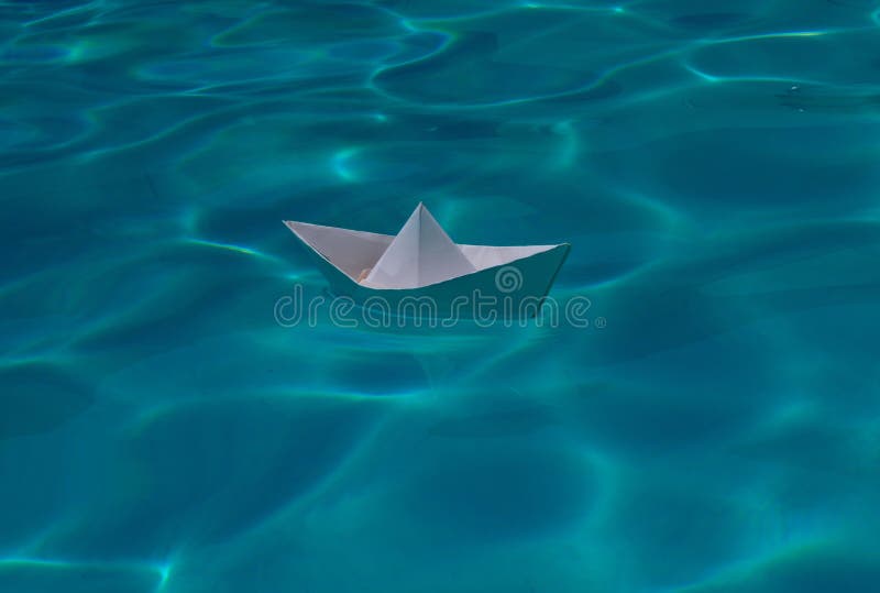 White Paper Boat into the Clear Sea Water. Stock Illustration ...
