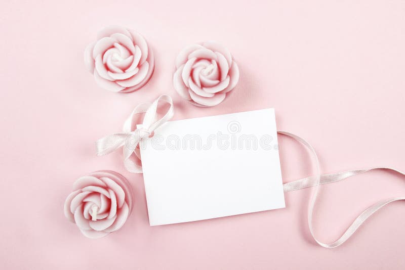 White Paper Card Decorated with Pink Bow and Rose Scented Candle Stock ...
