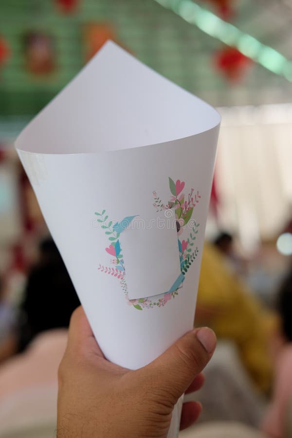 White Paper Cone in Hand for Wedding Stock Image - Image of cone ...
