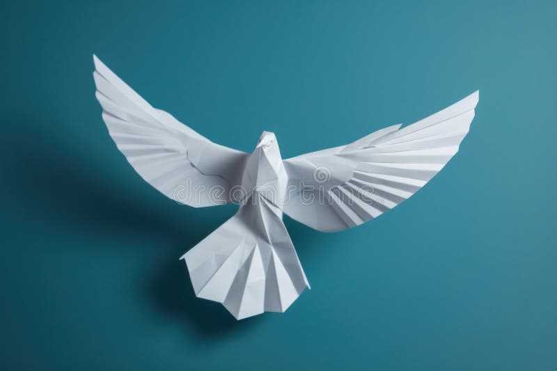 A White Paper Dove Origami on a Blank Grey Background Stock Photo ...