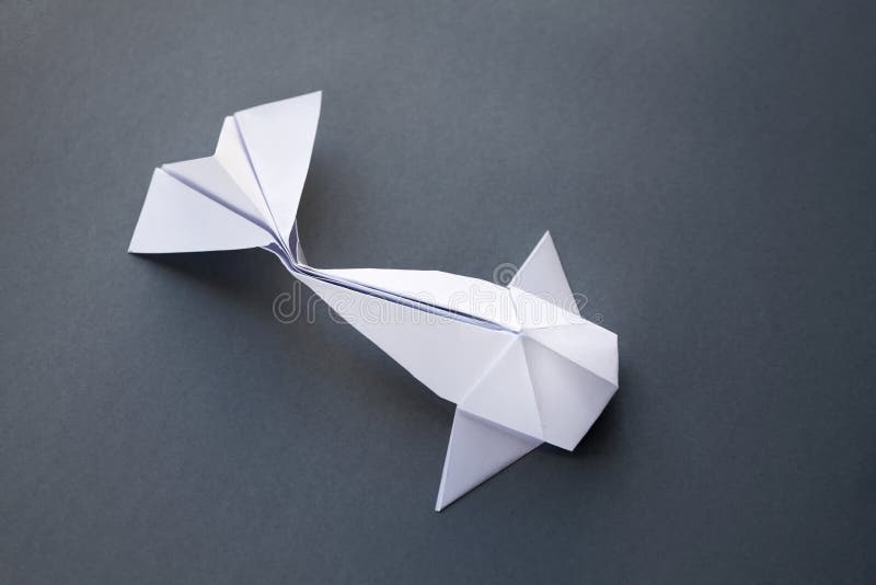 White Paper Fish Origami Isolated on a Grey Background Stock Photo ...