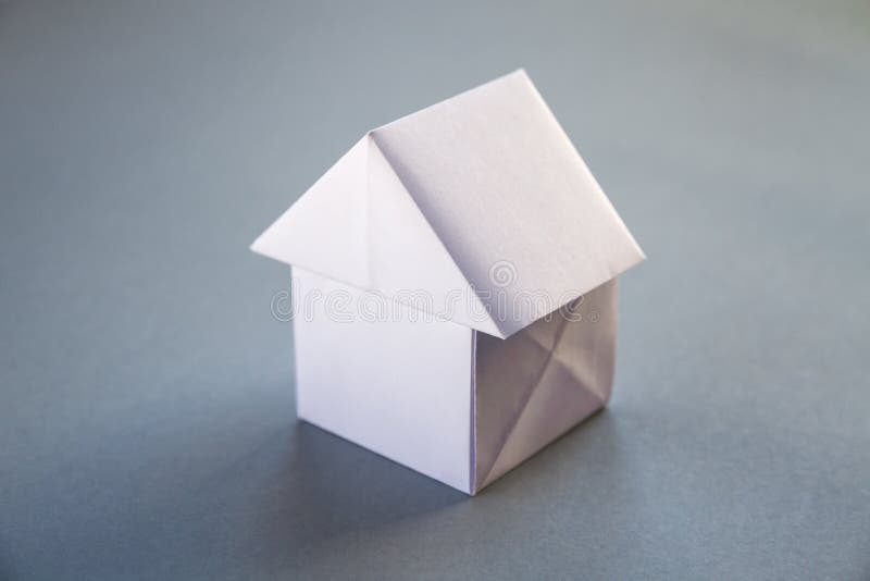 White Paper House Origami Isolated on a Grey Background Stock Photo ...