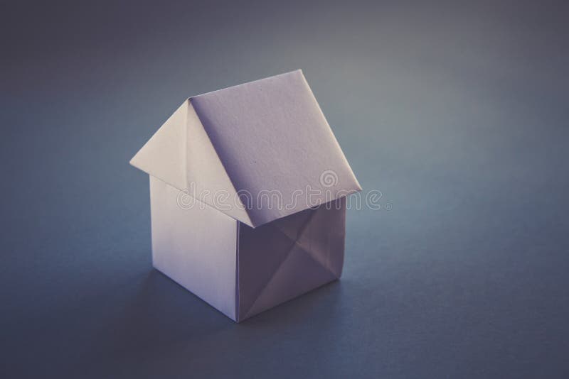 White Paper House Origami Isolated on a Grey Background Stock Image ...