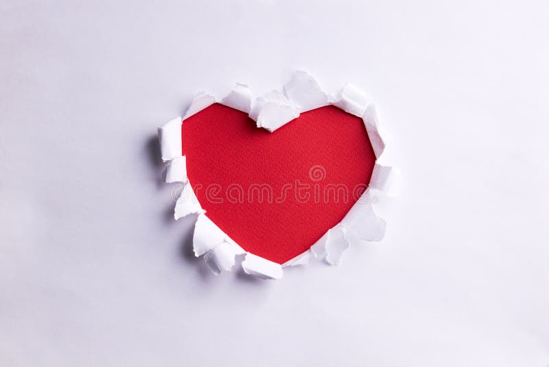 White Paper Love Shape Over Red Background. Love and Romance Concept ...
