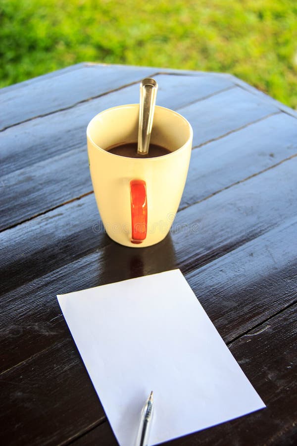Coffee Cup on the Table with White Paper Note and Stock Photo - Image ...
