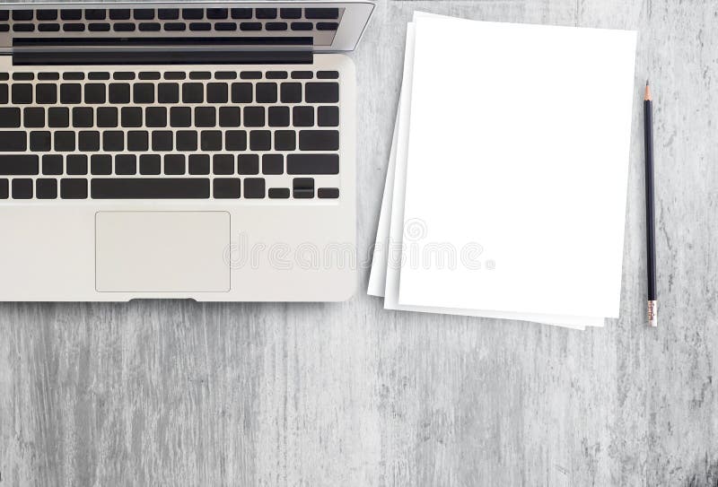 White Paper,pencil and Laptop Computer on Wood Table in Workplace ...