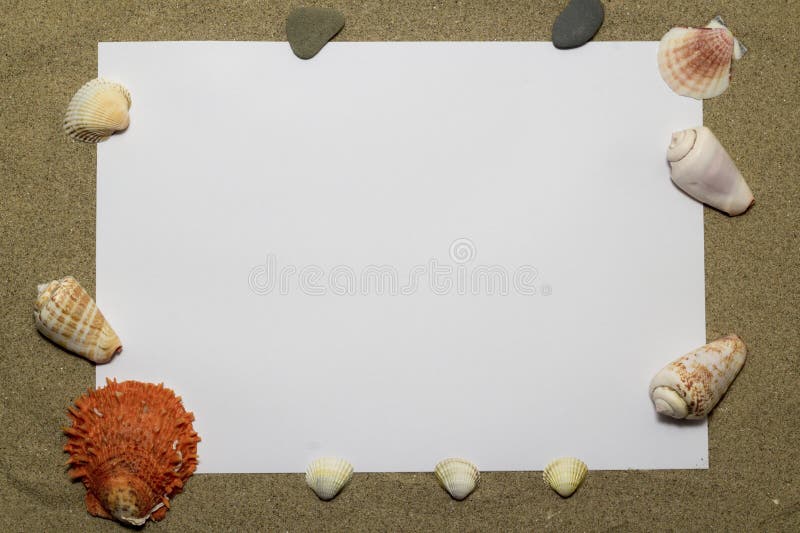 White paper on the sand stock photo. Image of paper, concept - 43415998