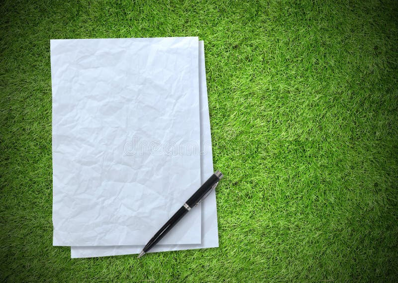 White Paper Sheet on Green Grass Background Stock Image - Image of ...