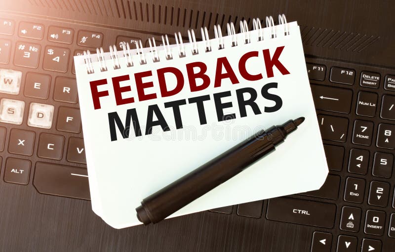 White Paper Sheet with Text FEEDBACK MATTERS on the Black Laptop Stock ...