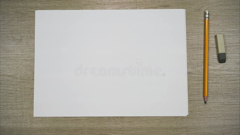 White Paper Sheets with Pencil and Eraser on the Table. Top View Stock ...