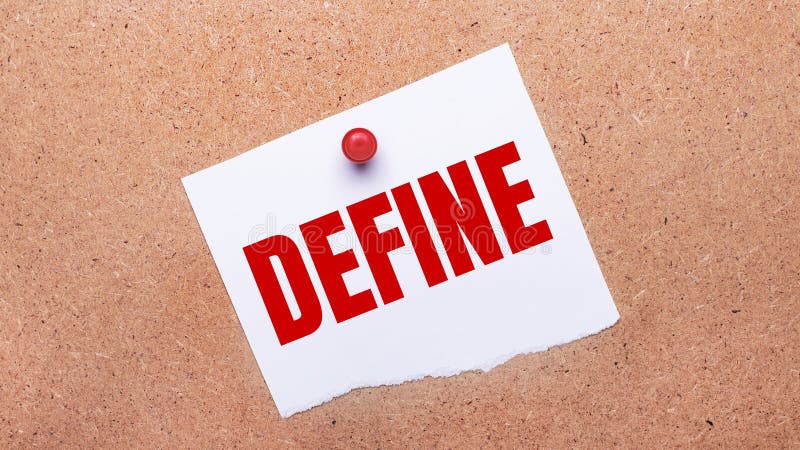 White Paper with the Text DEFINE is Attached To the Wooden Background ...