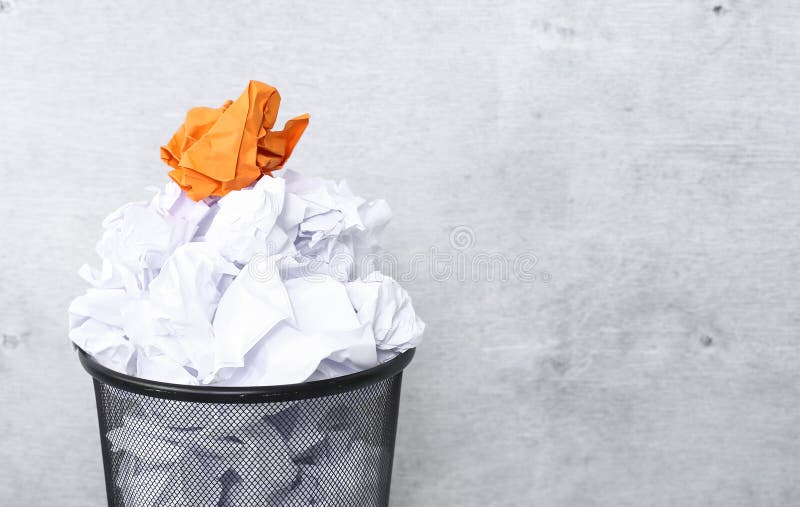 White Paper in the Trash Can Stock Photo - Image of orange, full: 49470194