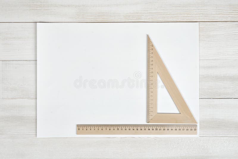 White Paper with Triangle and Simple Centimeter Ruler. Stock Photo ...