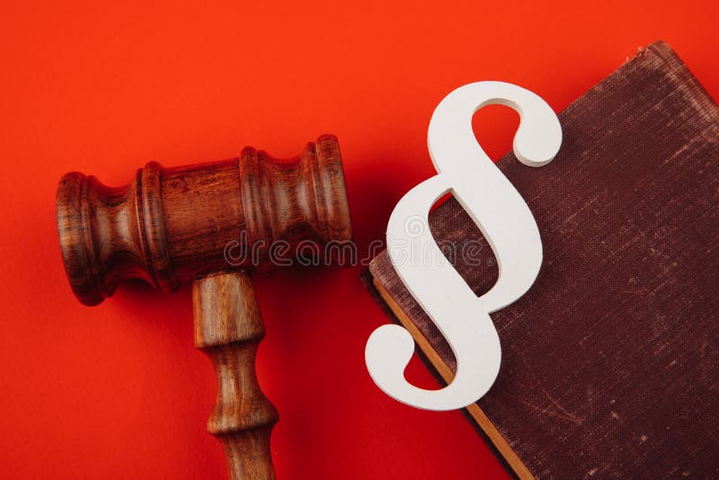 White Paragraph Symbol is on a Law Book and Gavel Close-up Stock Image ...
