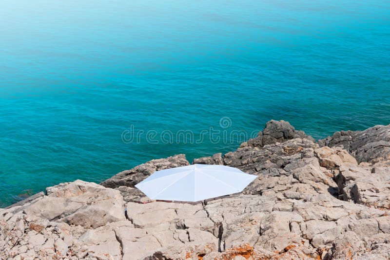 White Parasol Beach stock photo. Image of blue, ocean - 21943496