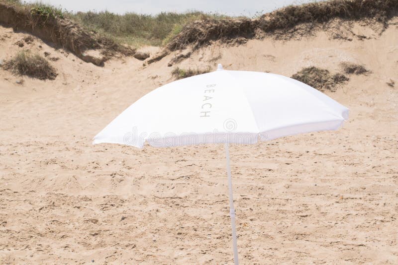 White Parasol on the Beach. Stock Photo - Image of words, tourism: 99014462