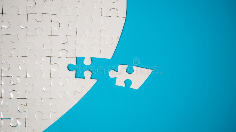 White Part of Jigsaw Puzzle Pieces on Blue Background. Concepts of ...
