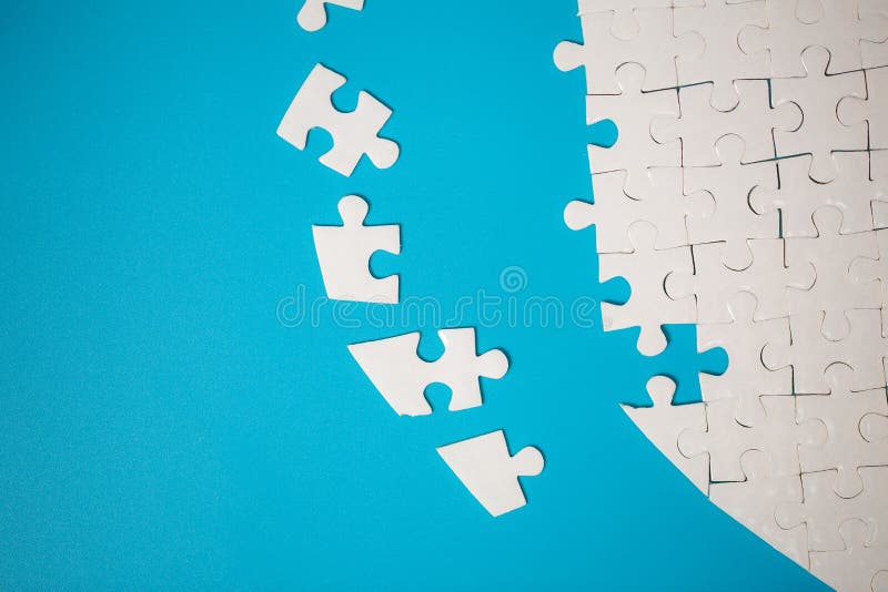 White Part of Jigsaw Puzzle Pieces on Blue Background. Concepts of ...
