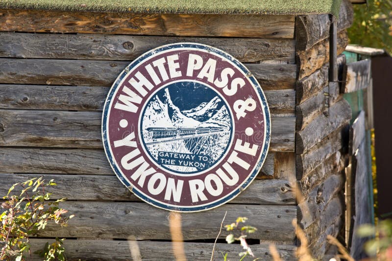 White Pass and Yukon Route Sign on Old Log Building, Carcross Editorial ...