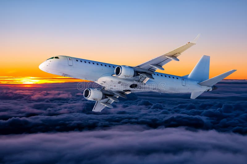 White Passenger Aircraft Fly in the Sunset Sky Stock Image - Image of ...