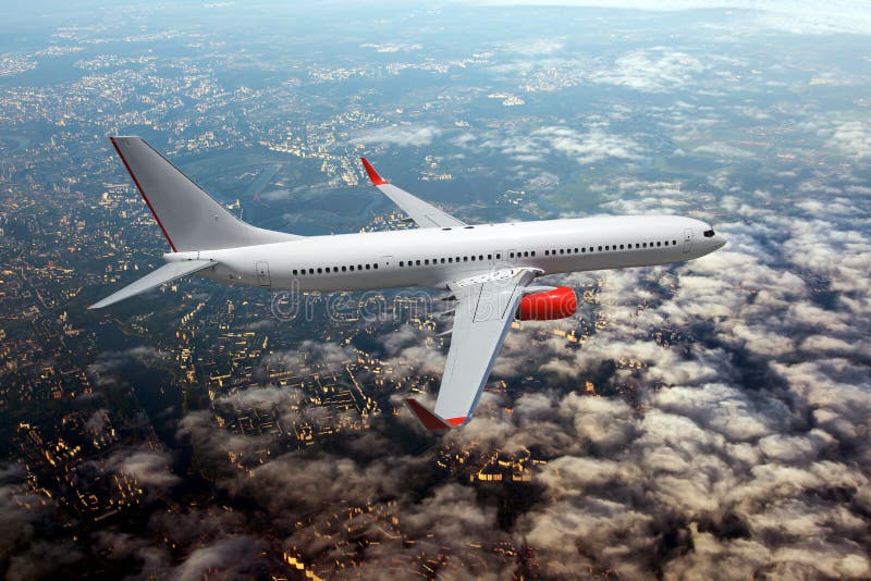 Passenger Plane Fly High Over the Clouds. View from Above Stock Image ...