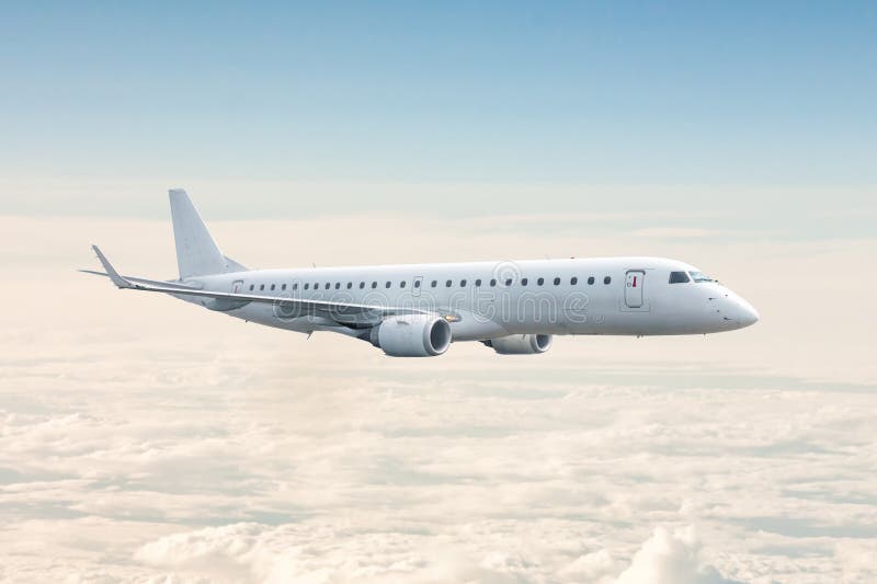 White Passenger Jetliner Fly in the Air Above the Clouds Stock Image ...