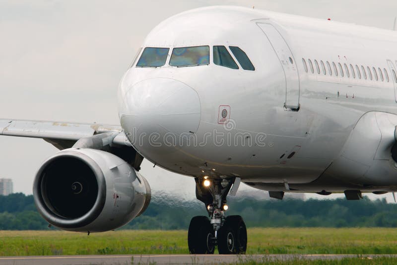 White passenger plane stock photo. Image of plane, runway - 60451308