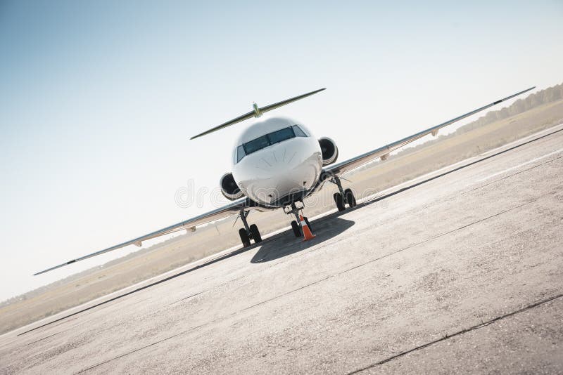 White Passenger Regional Jet Facing the Camera. Stock Photo - Image of ...