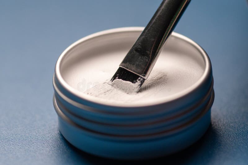White Paste and Brush for Marking the Shape of the Eyebrows, Close-up ...