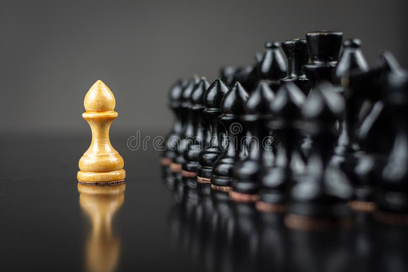 White Pawn, in Front of Black, on a Chessboard. Selective Focus ...