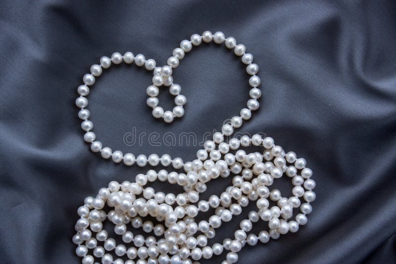 White pearls stock photo. Image of decoration, folded - 16877806