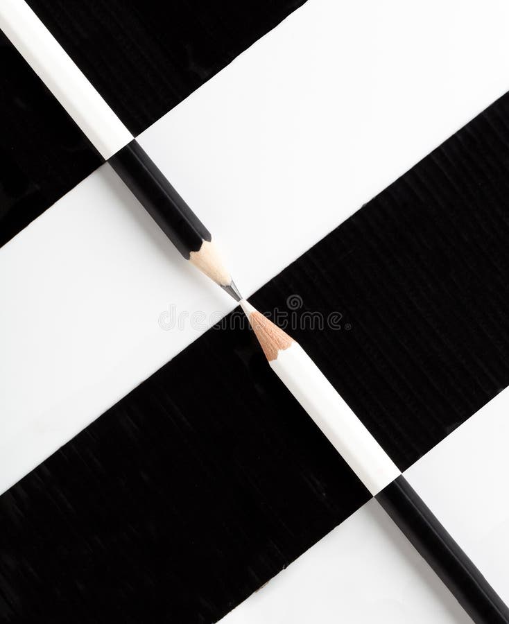 White Pencil and Black Pencil Placed on Opposite Color Stock Image ...