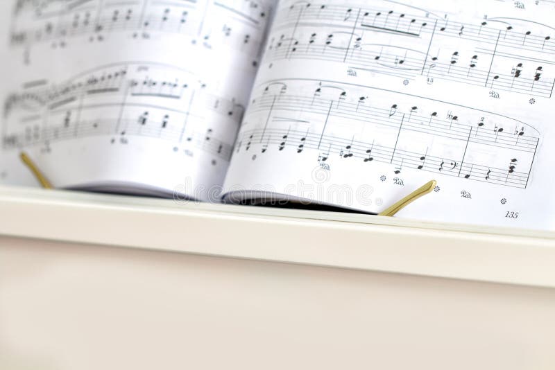 White Piano with Piano Notes. Close Up Stock Image - Image of light ...