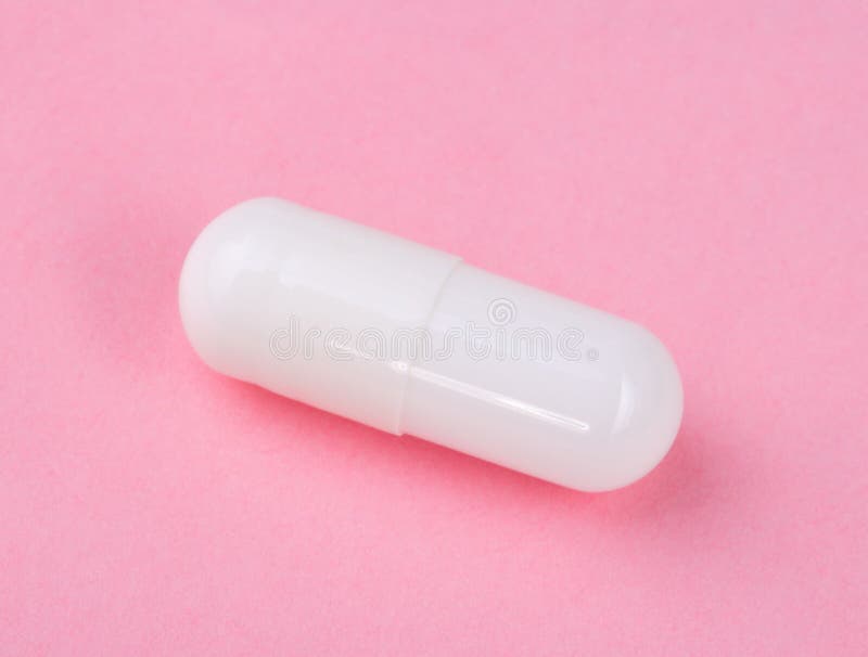White Pill on Pink Background Stock Image - Image of health ...