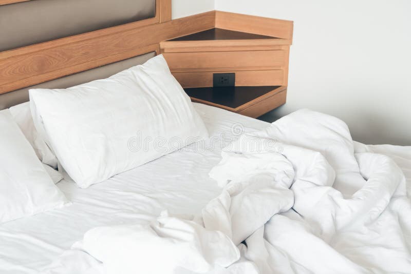 White Pillow with Rumpled Bed Stock Image - Image of room, clean: 108679729
