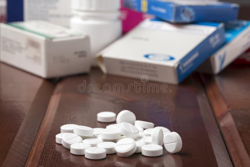 White pills and pill boxes stock image. Image of pharmacies - 66361637