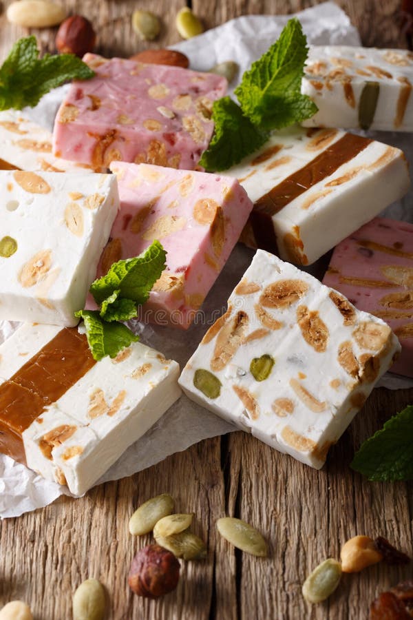 White and Pink Nougat with Almonds and Pumpkin Seeds Close-up. V Stock ...
