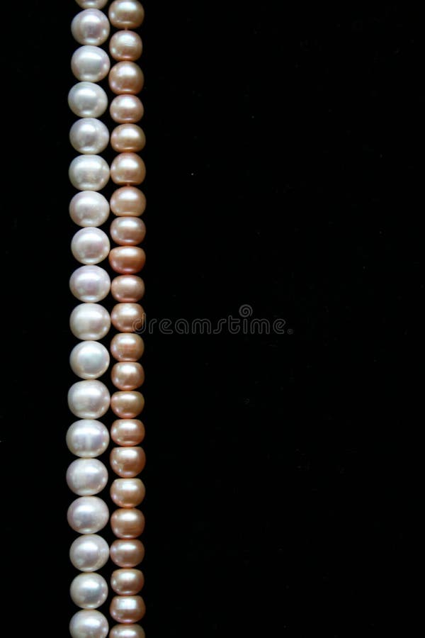 White Pearls On The Black Silk As Background Stock Photo - Image of ...