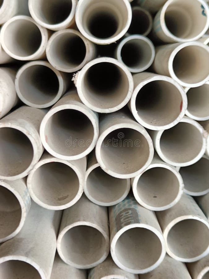 White Pipes Arranged Upwards with Dark Shadow Stock Image - Image of ...