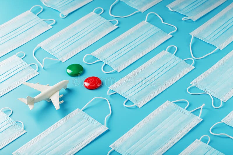 A White Plane Surrounded by Protective Masks on a Blue Background with ...