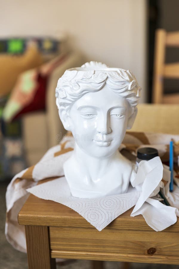 A White Plaster Female Head for Coloring on the Table, Stock Photo ...